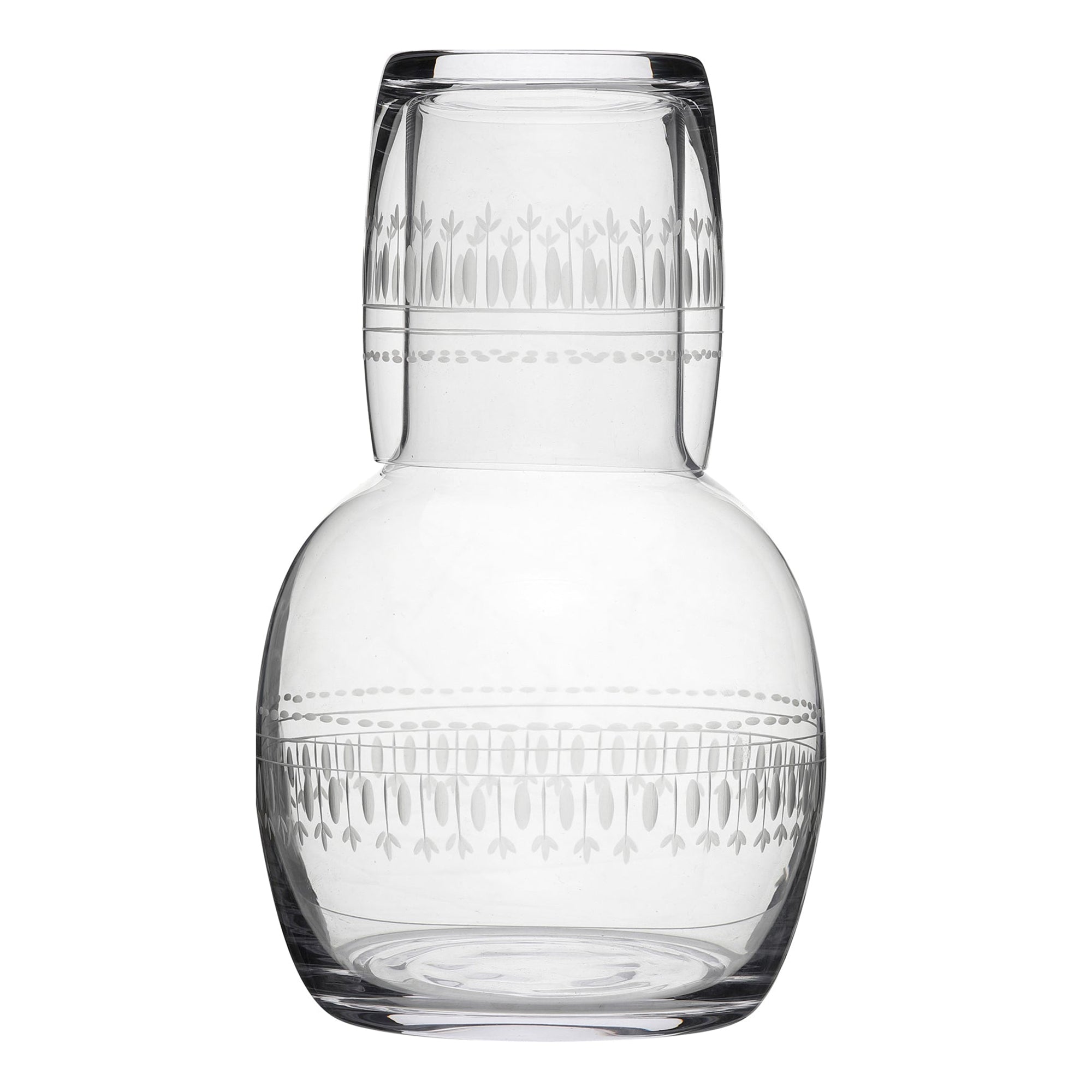 A Crystal Carafe Set with Ovals Design